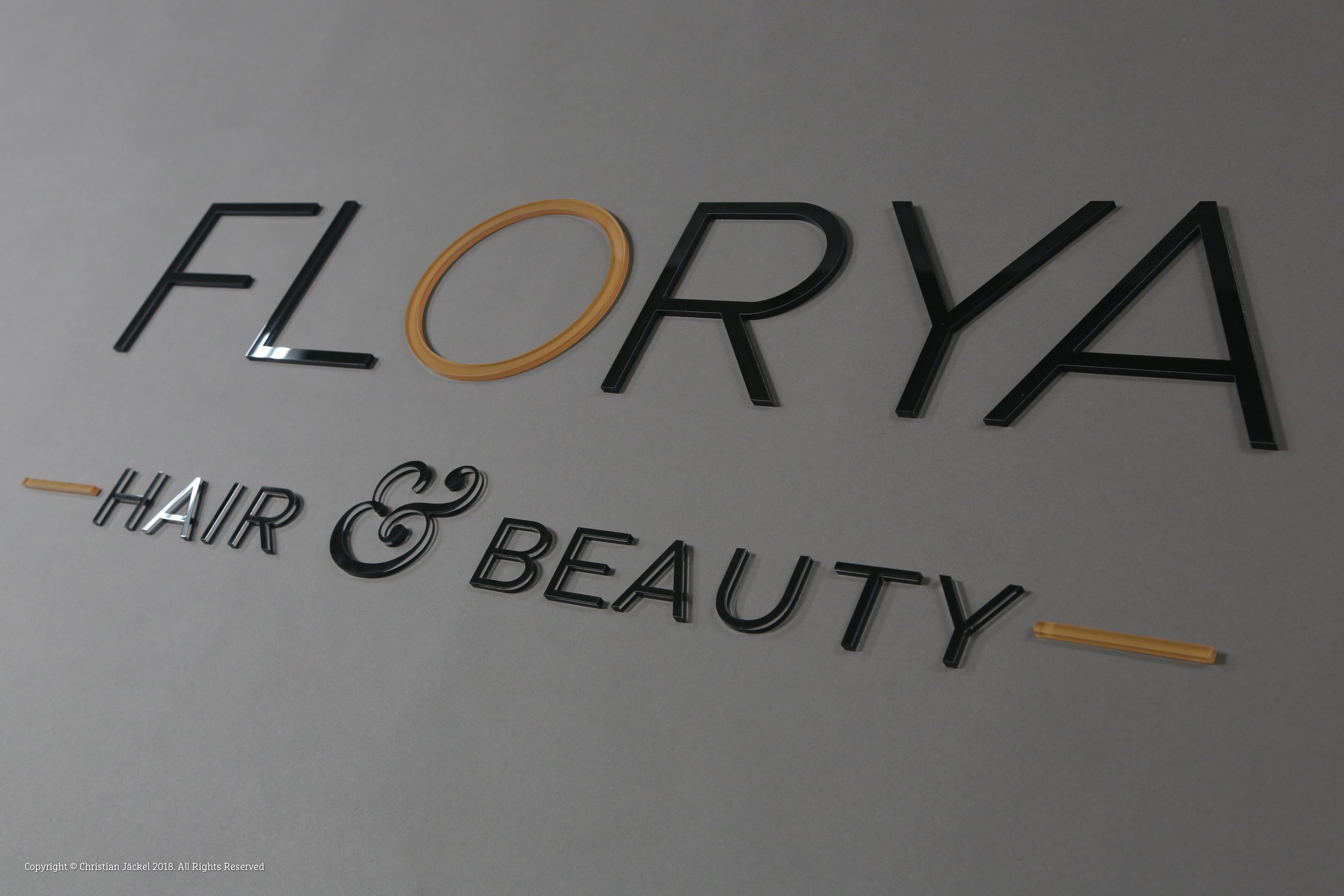 3D Buchstaben und Logos aus rückseitig bedrucktem Acrylglas